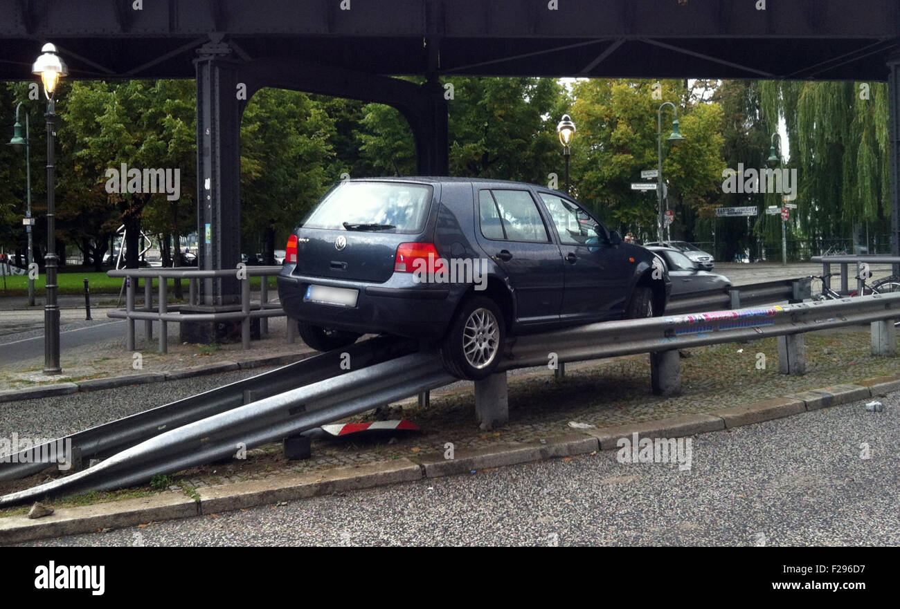 Berlin, Germany. 14th Sep, 2015. A car seen on top of a crash barrier ...