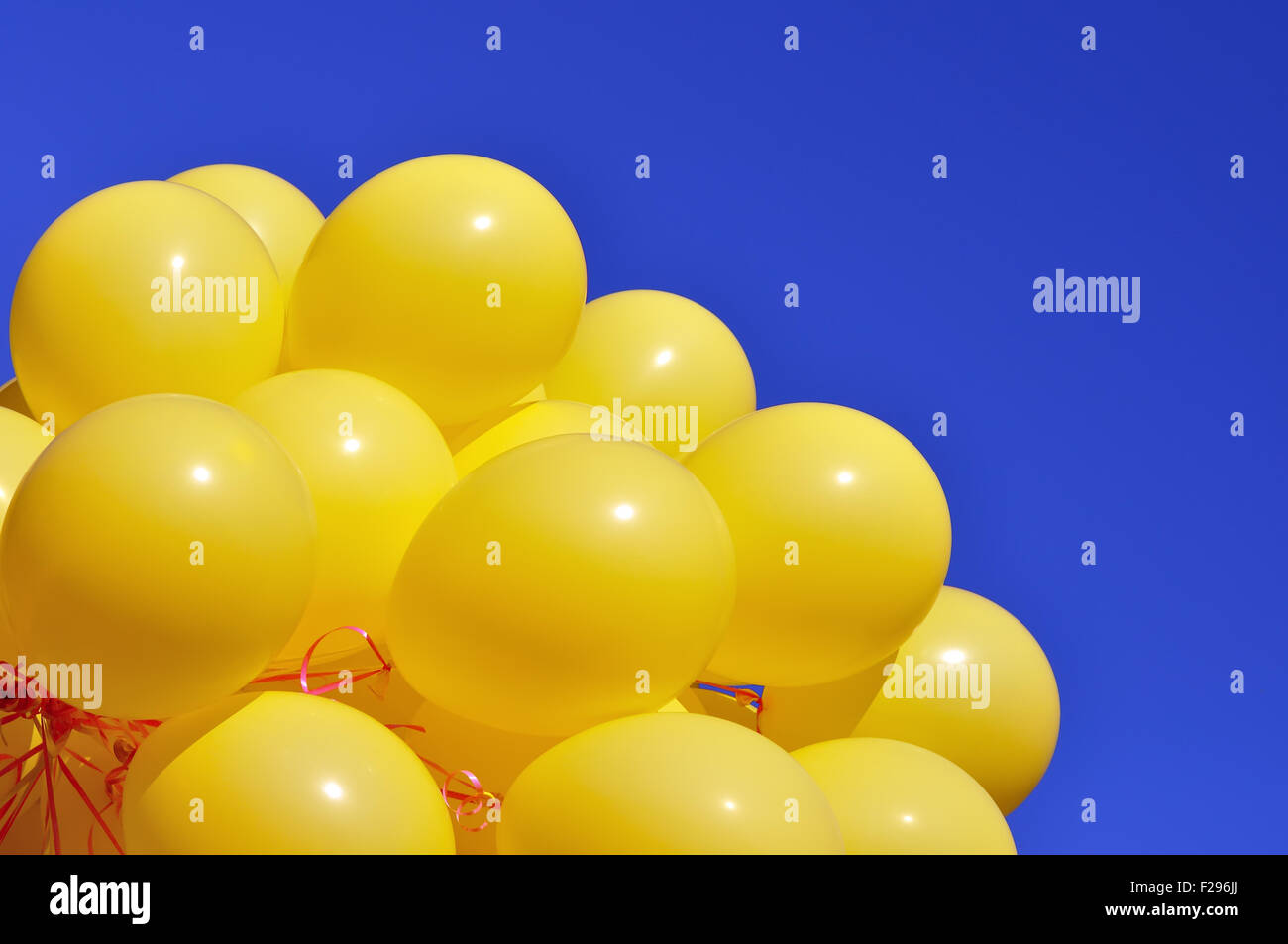 Yellow balloons hi-res stock photography and images - Alamy