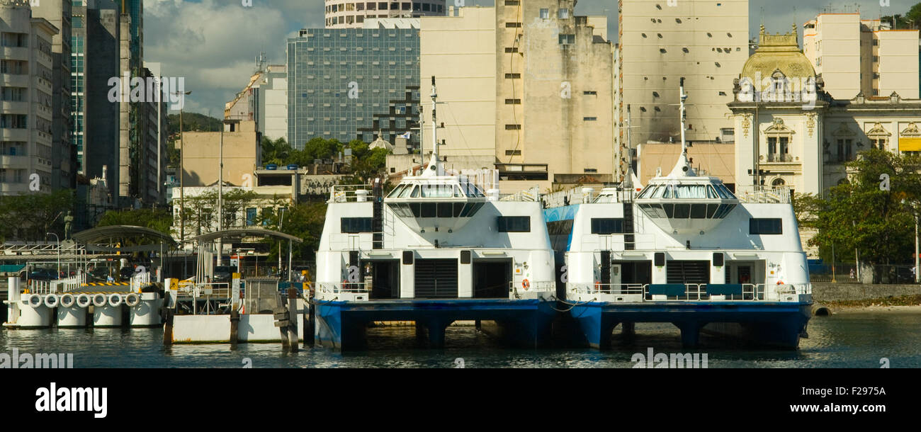 Catamaran in the sea with city in the background, Niteroi, Rio de ...