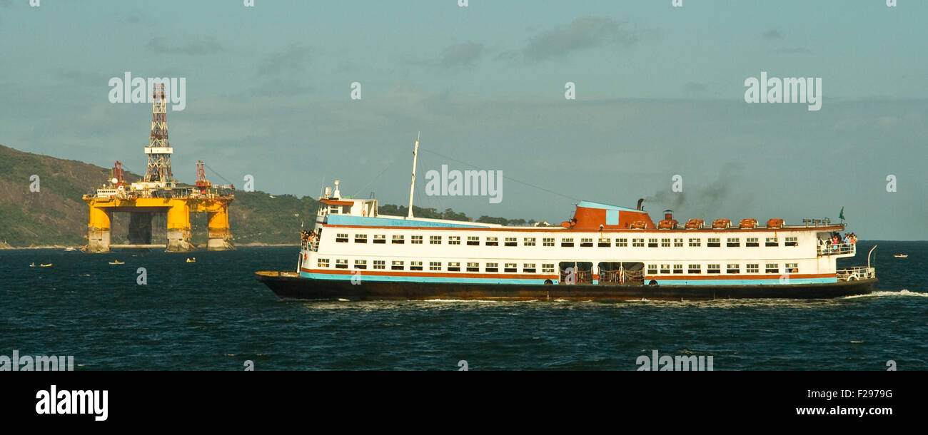 Ferry boat called 'Barca' with oil rig in Guanabara Bay, Rio De Janeiro ...