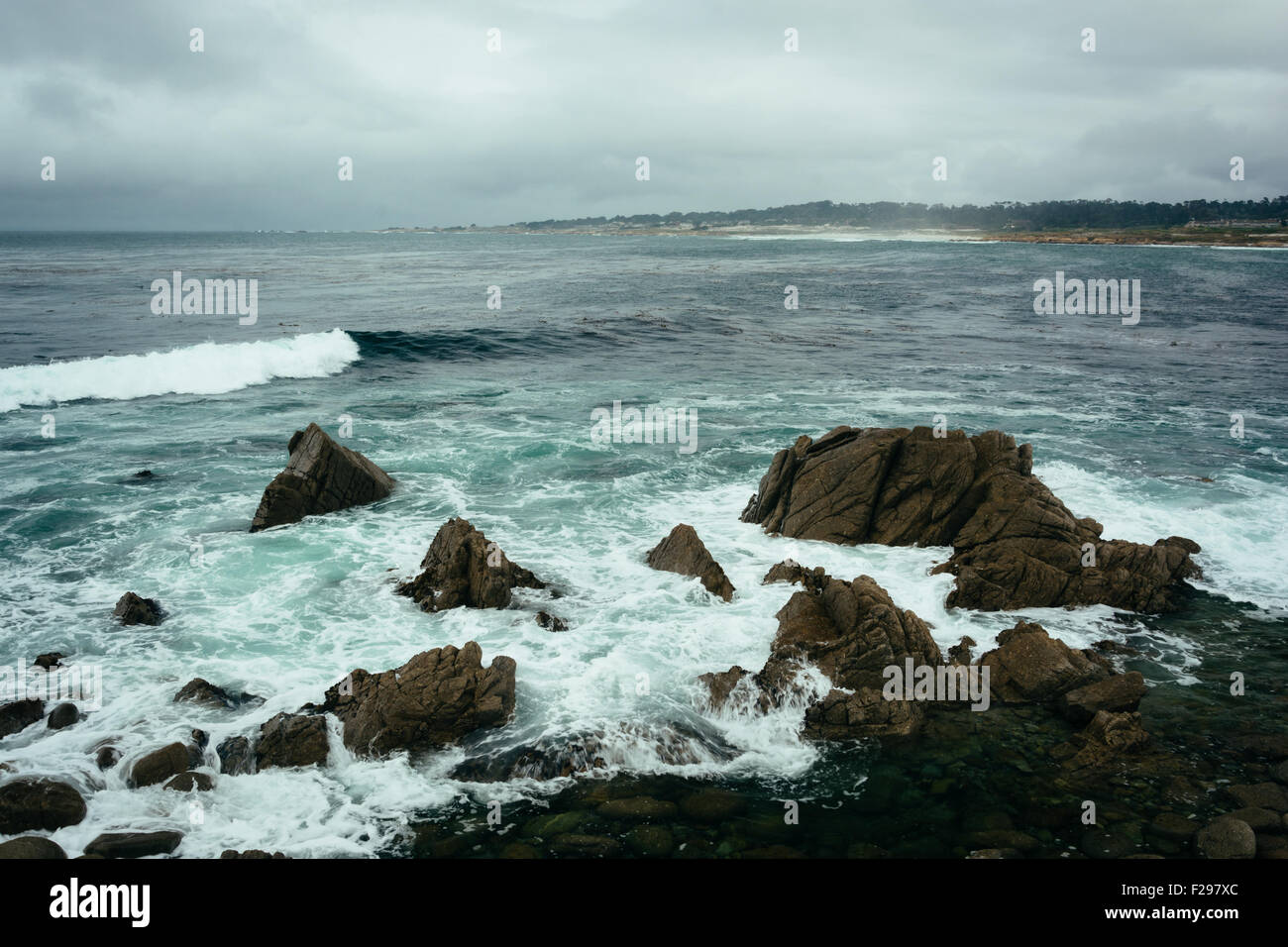 Rocks and waves in the Pacific Ocean, seen from the 17 Mile Drive, in ...