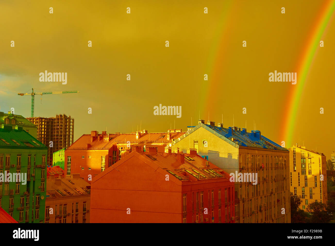 Double rainbow over the city Stock Photo - Alamy
