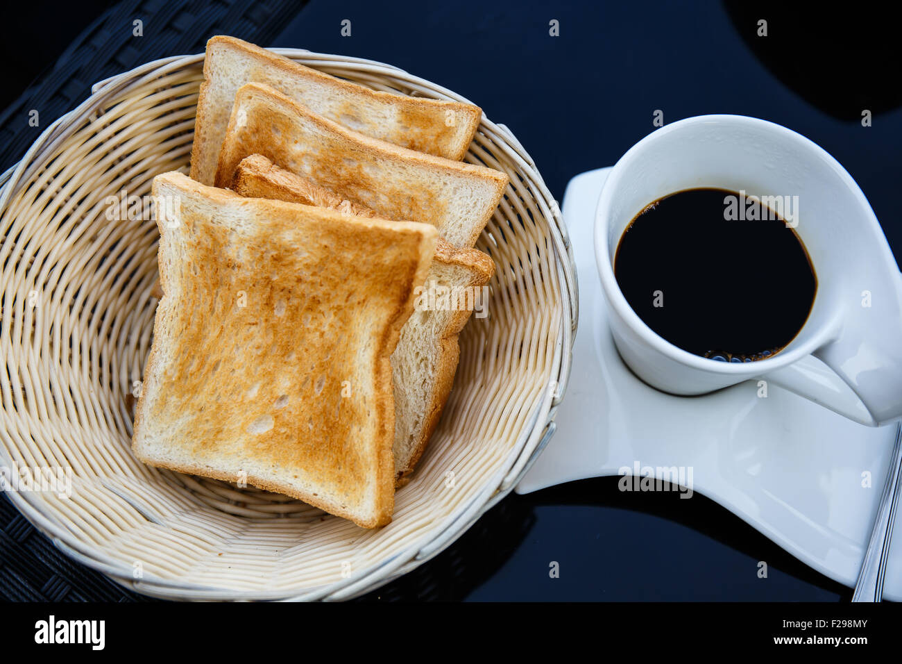 Coffee and toast on the table Stock Photo - Alamy