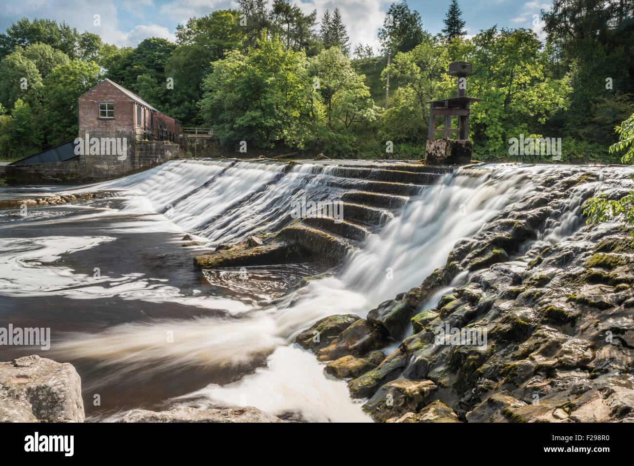 Linton Falls weir, Grassington, on a sunny day Stock Photo - Alamy