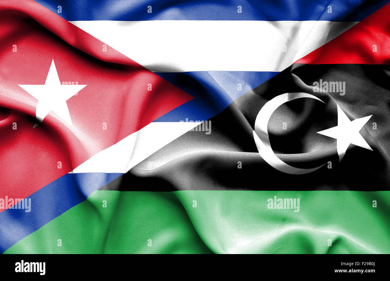 Waving flag of Libya and Cuba Stock Photo - Alamy