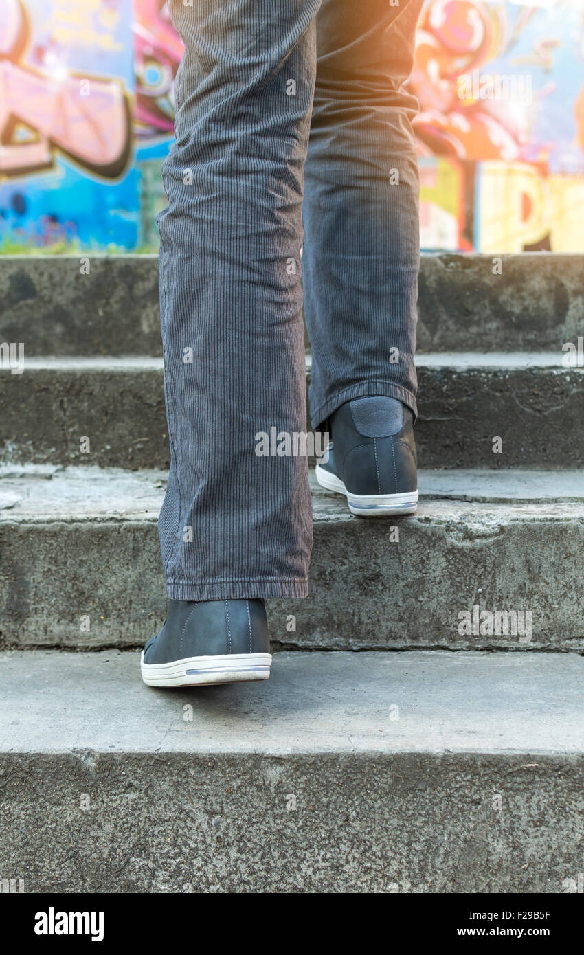 Person walking on stairs. Selective focus Stock Photo - Alamy