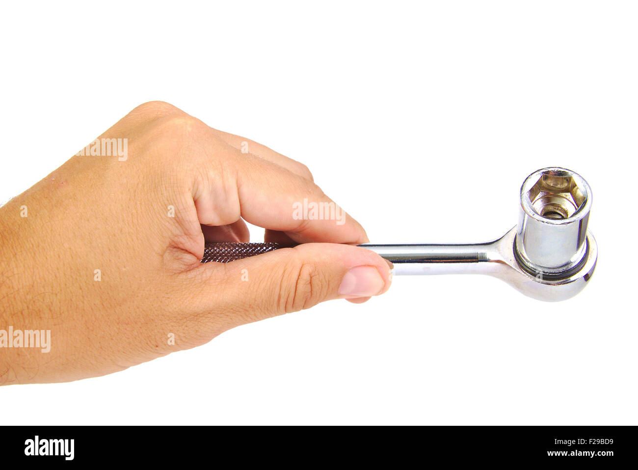 Hand holding a ratchet isolated on white background Stock Photo - Alamy