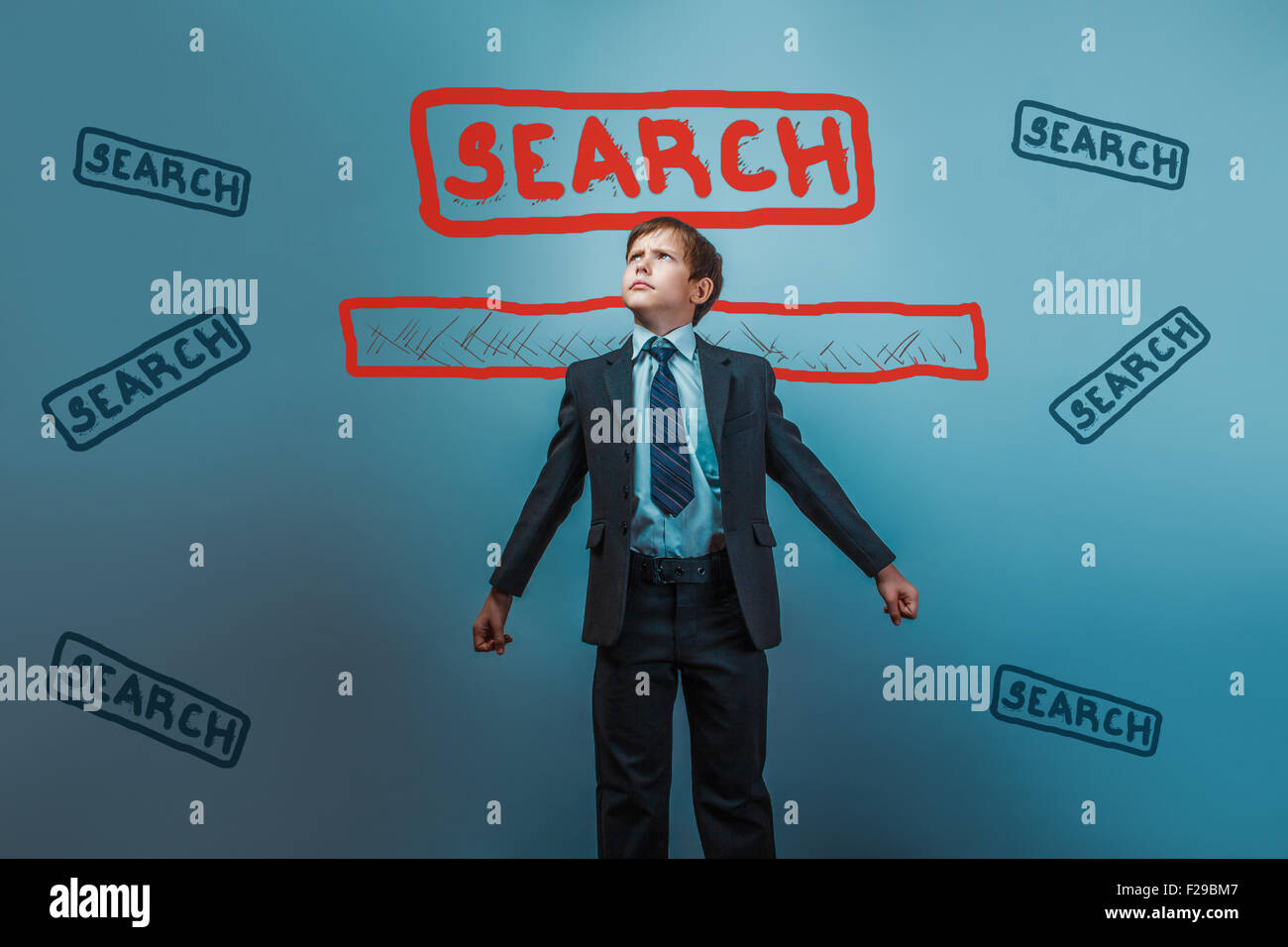 a boy of twelve European appearance in a suit holding a blank sh Stock ...