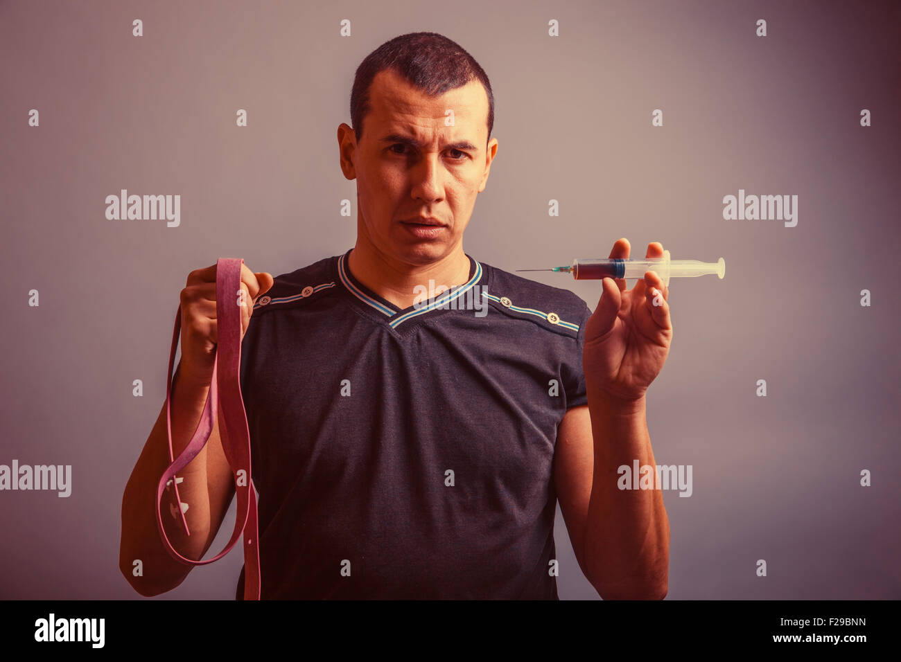 portrait of a man of European appearance brunet holding a tourni Stock ...