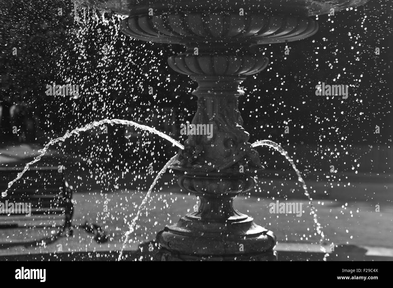 Water droplets splash from the fountain in Poole Park Stock Photo - Alamy