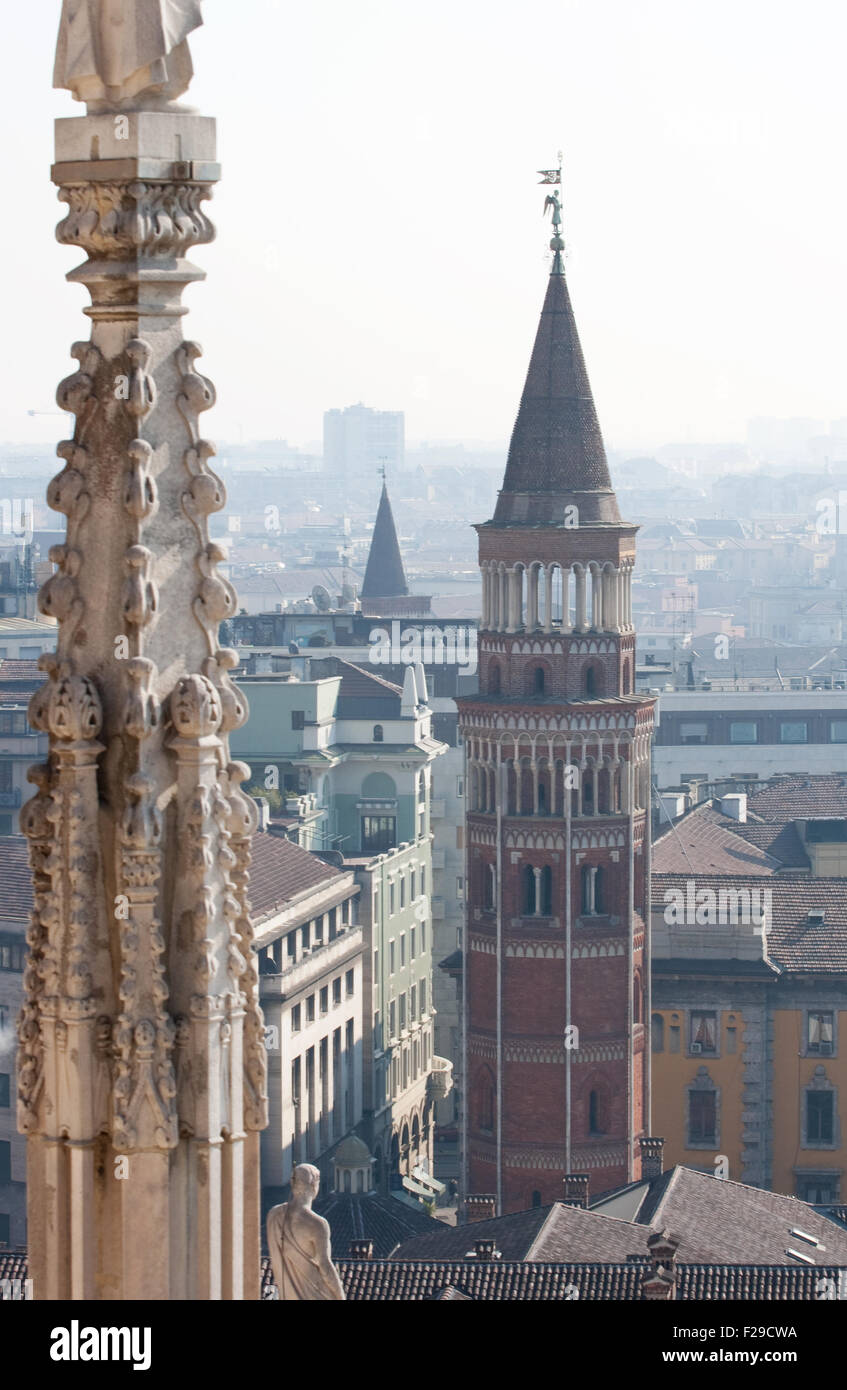 Bell tower next to the Milan cathedral - Italy Stock Photo - Alamy