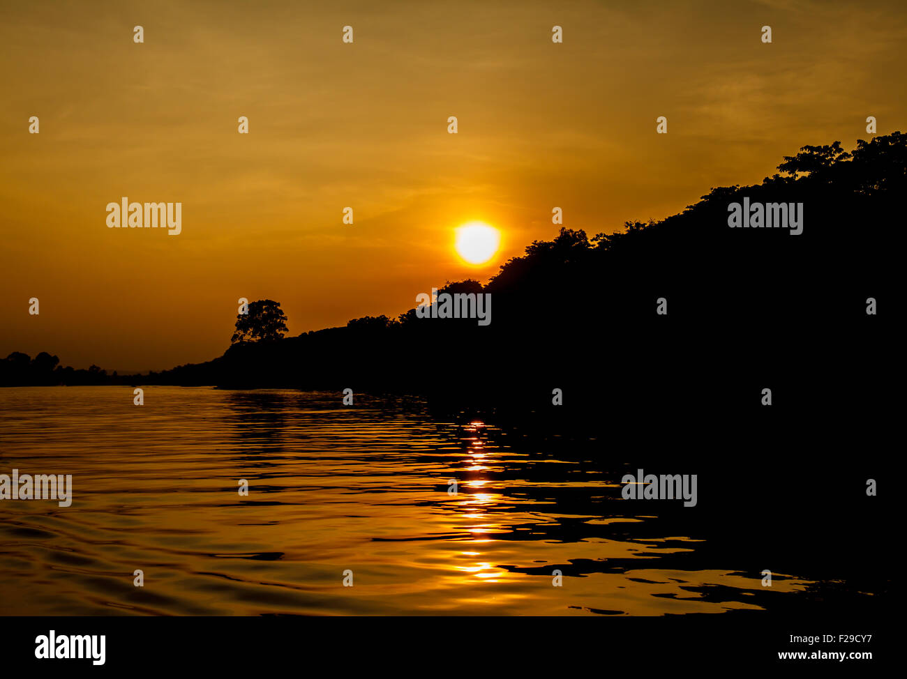 Sunset on the river Stock Photo - Alamy