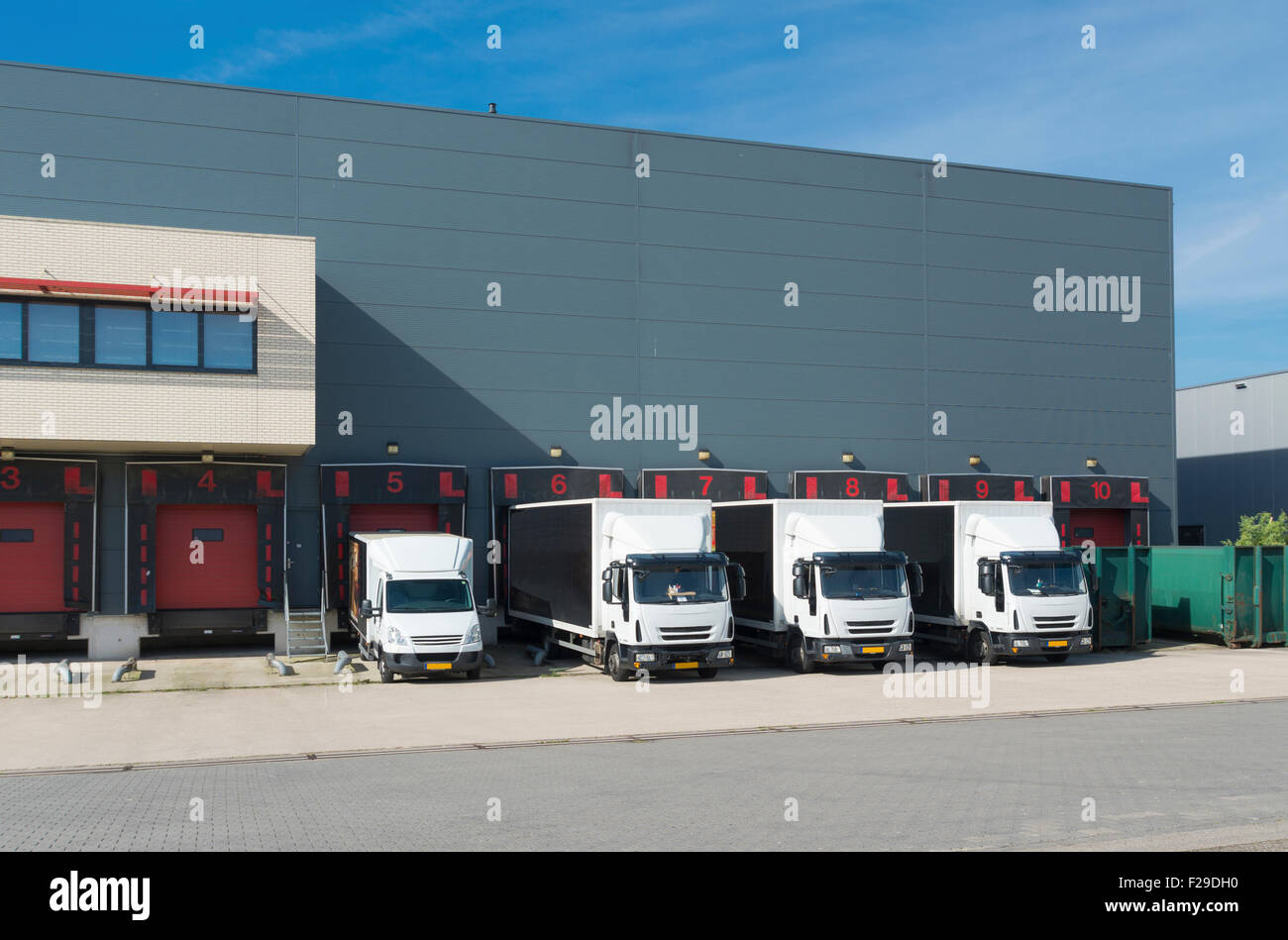 Warehouse distribution trucks hi-res stock photography and images - Alamy
