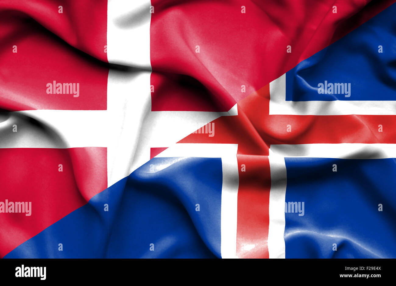Waving flag of Iceland and Denmark Stock Photo - Alamy