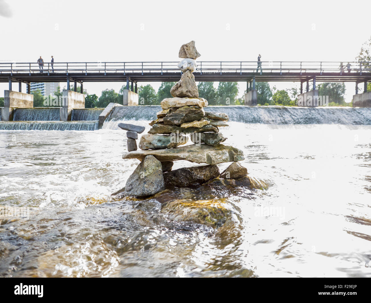 Stack of rocks balancing in Isar river, Bavaria, Germany Stock Photo ...