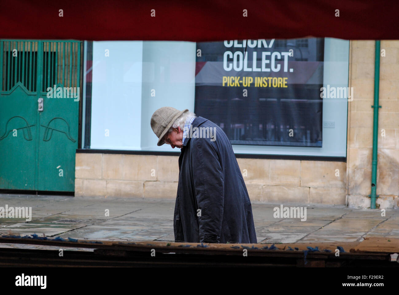 Walking stooping hi-res stock photography and images - Alamy