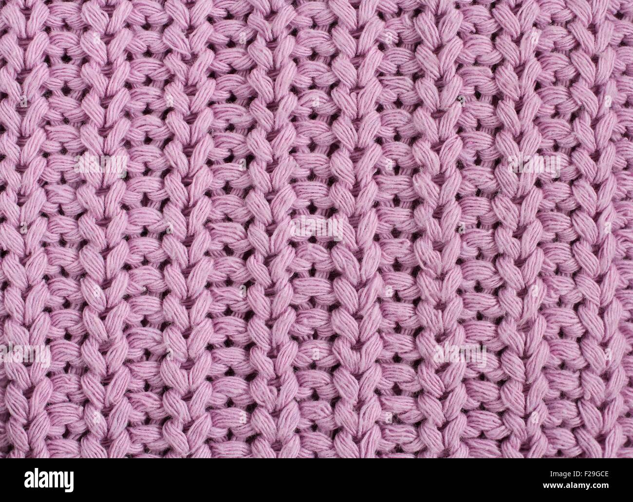 Pink wool knitted fabric hi-res stock photography and images - Alamy