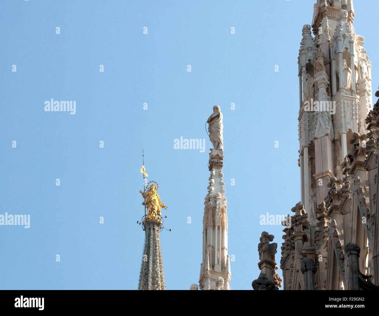 Gold statue of virgin mary, Milan cathedral - Italy Stock Photo - Alamy