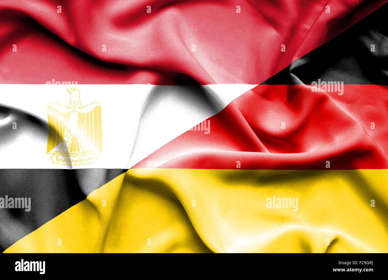 Waving flag of Germany and Egypt Stock Photo - Alamy