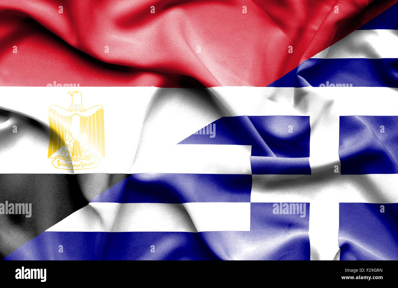 Waving flag of Greece and Egypt Stock Photo - Alamy