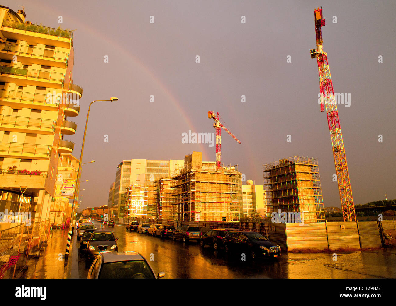 Rainbow in the city, Milan - Italy Stock Photo - Alamy