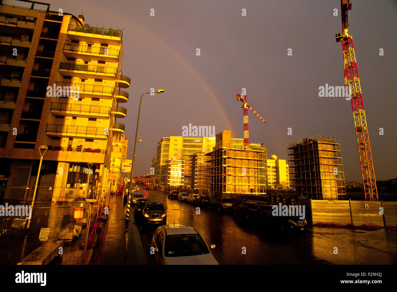 Rainbow in the city, Milan - Italy Stock Photo - Alamy