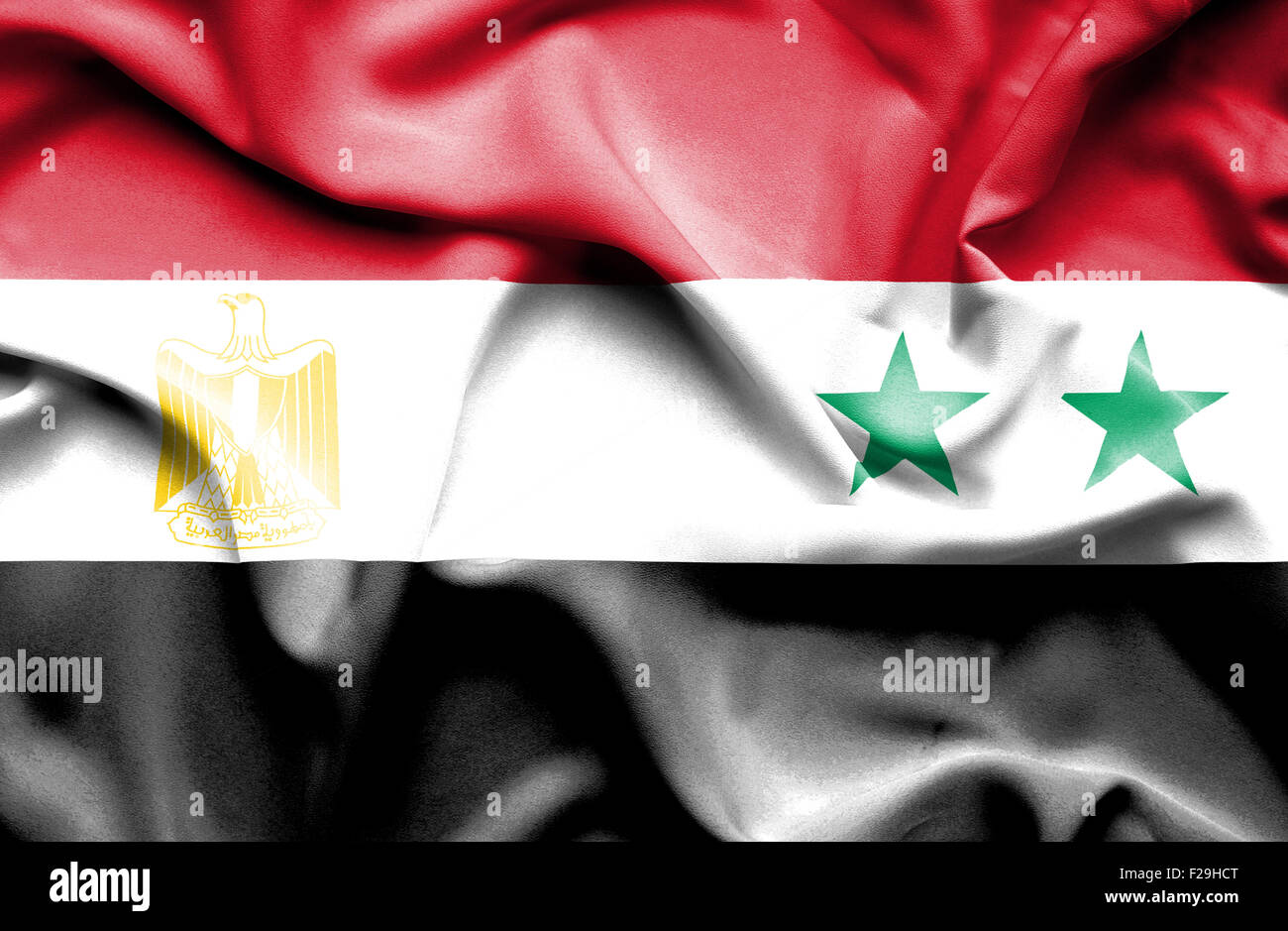 Waving flag of Syria and Egypt Stock Photo - Alamy