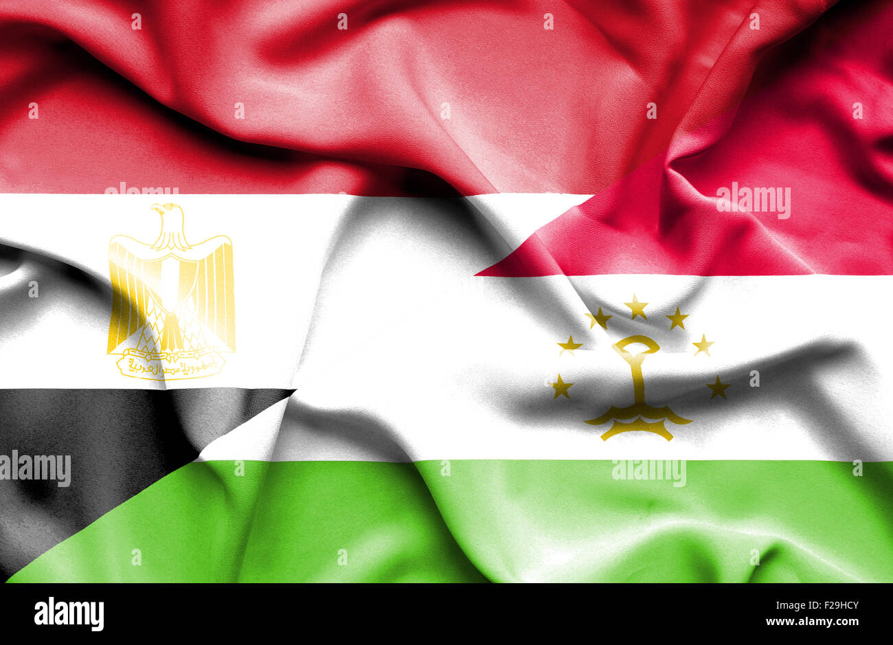 Waving flag of Tajikistan and Egypt Stock Photo - Alamy