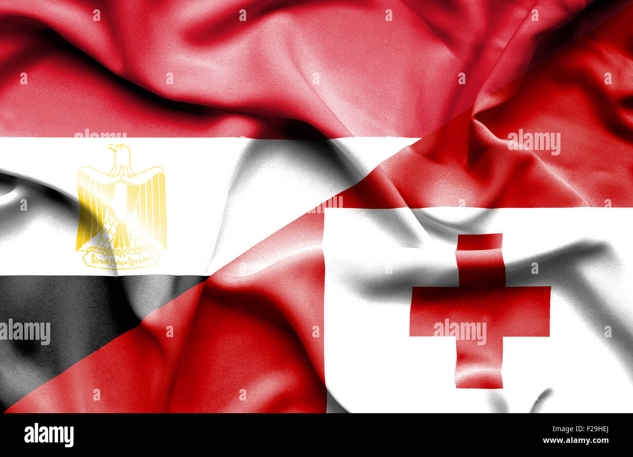 Waving flag of Tonga and Egypt Stock Photo - Alamy