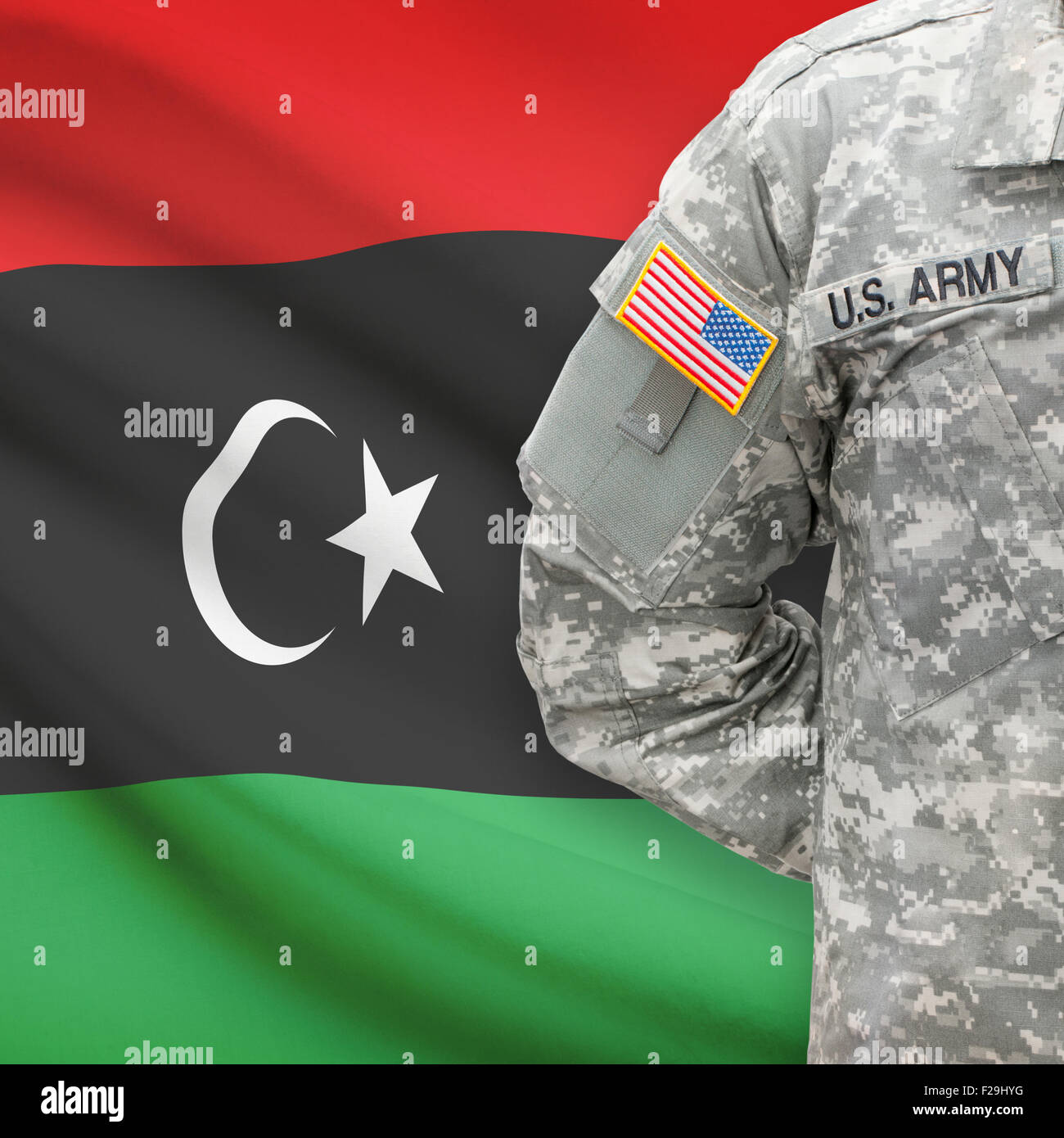 American soldier with flag on background series - Libya Stock Photo - Alamy
