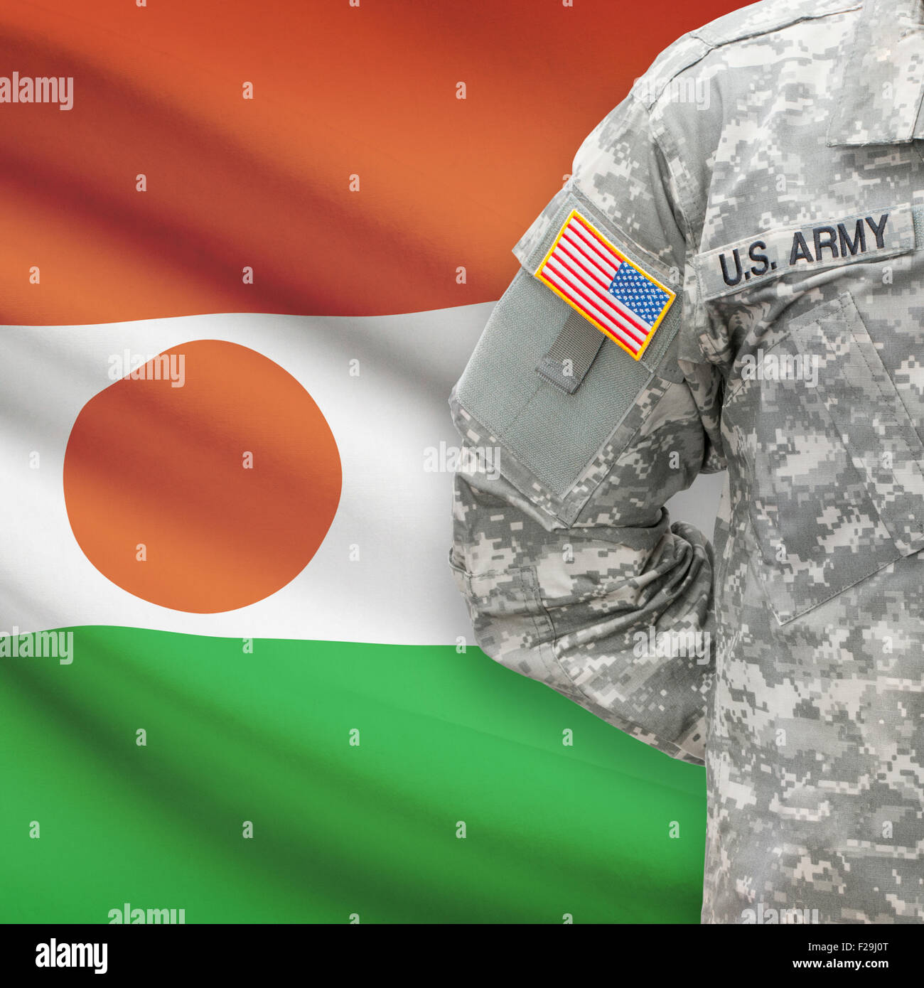 American soldier with flag on background series - Niger Stock Photo - Alamy
