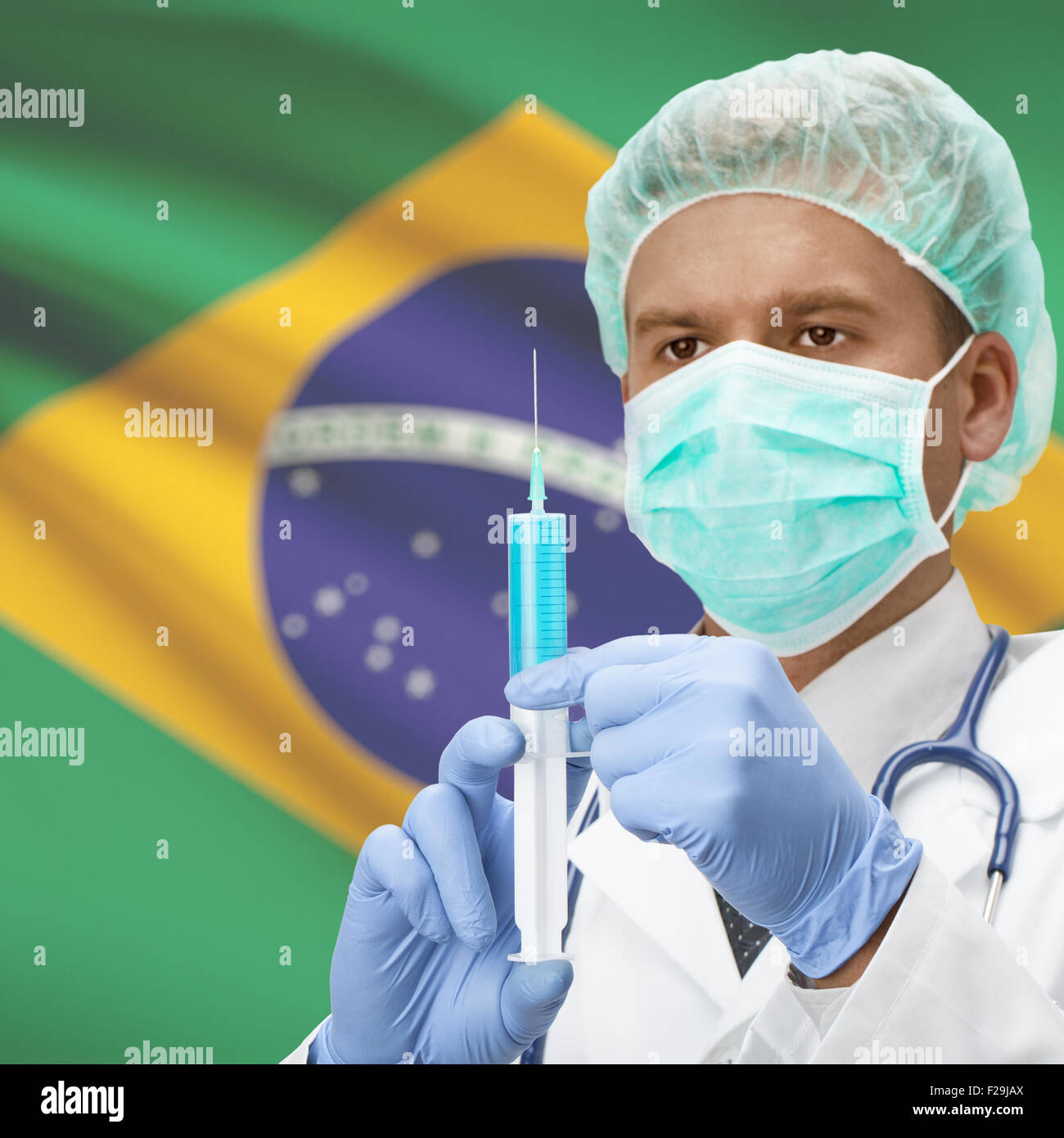 Doctor with syringe in hands and flag on background series - Brazil ...