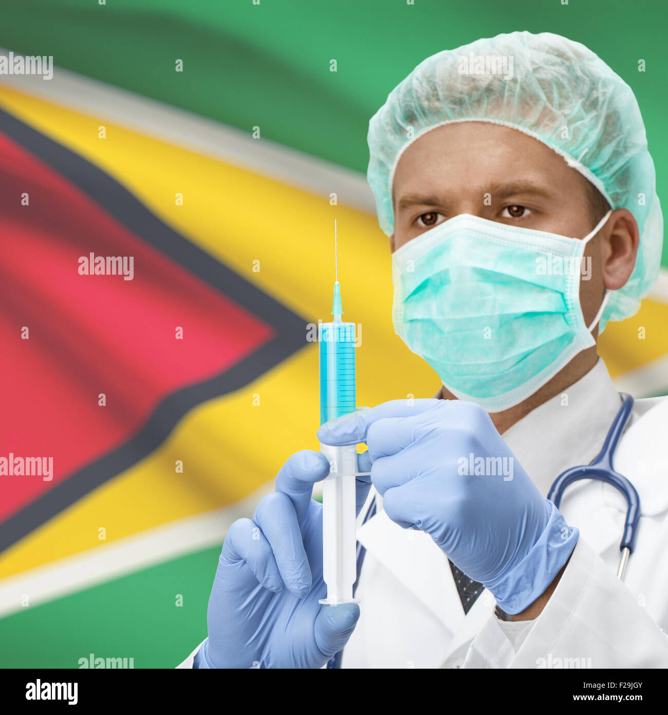 Doctor with syringe in hands and flag on background series - Guyana ...