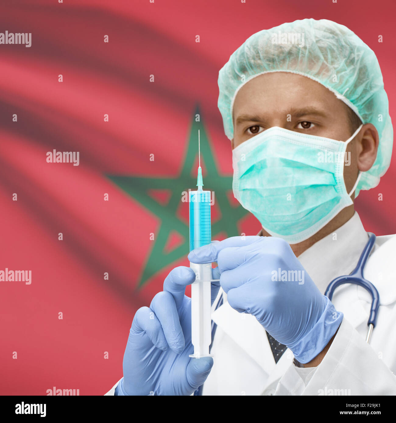 Doctor with syringe in hands and flag on background series - Morocco ...
