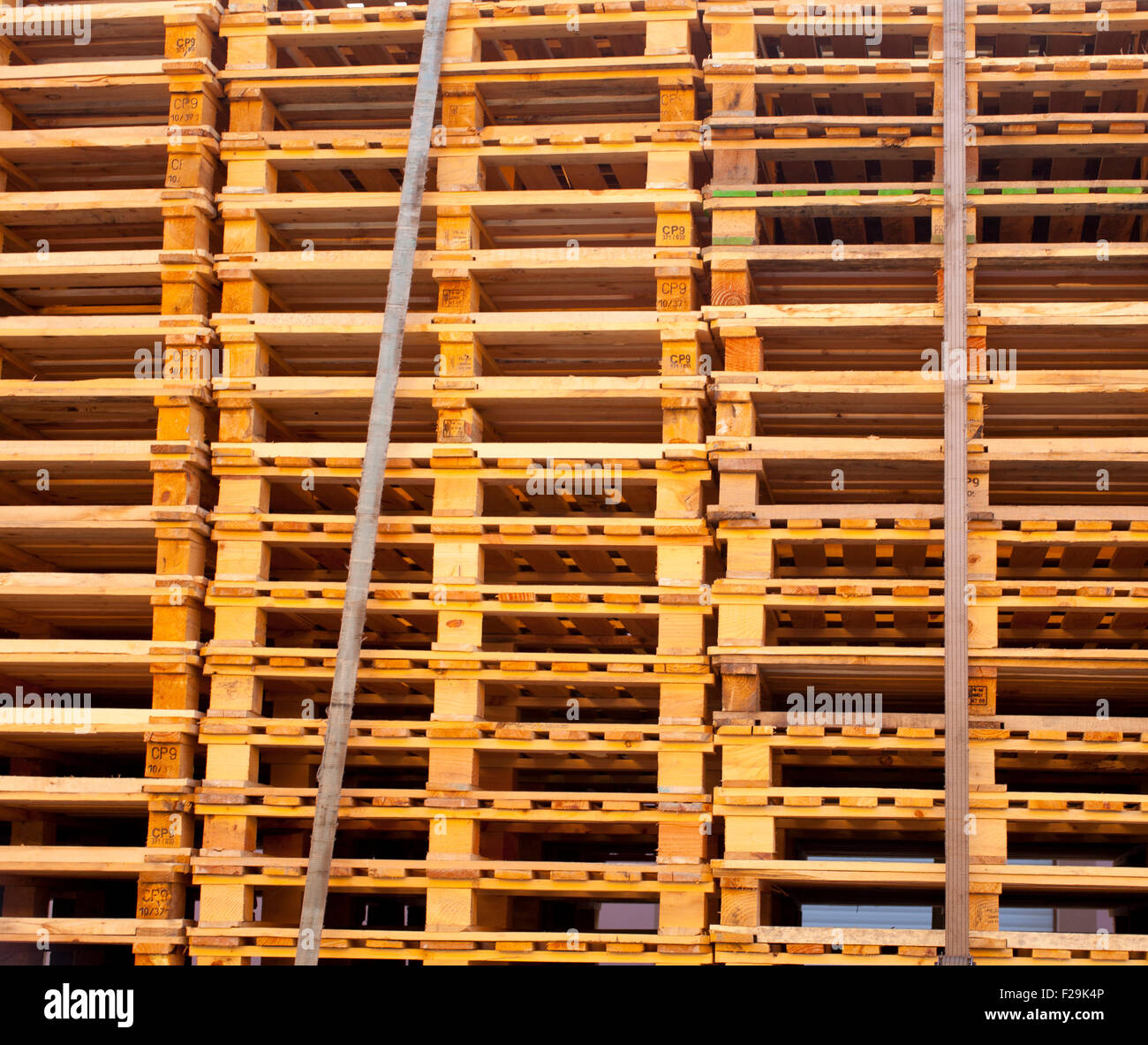 Stack of blue wooden pallets hi-res stock photography and images - Alamy