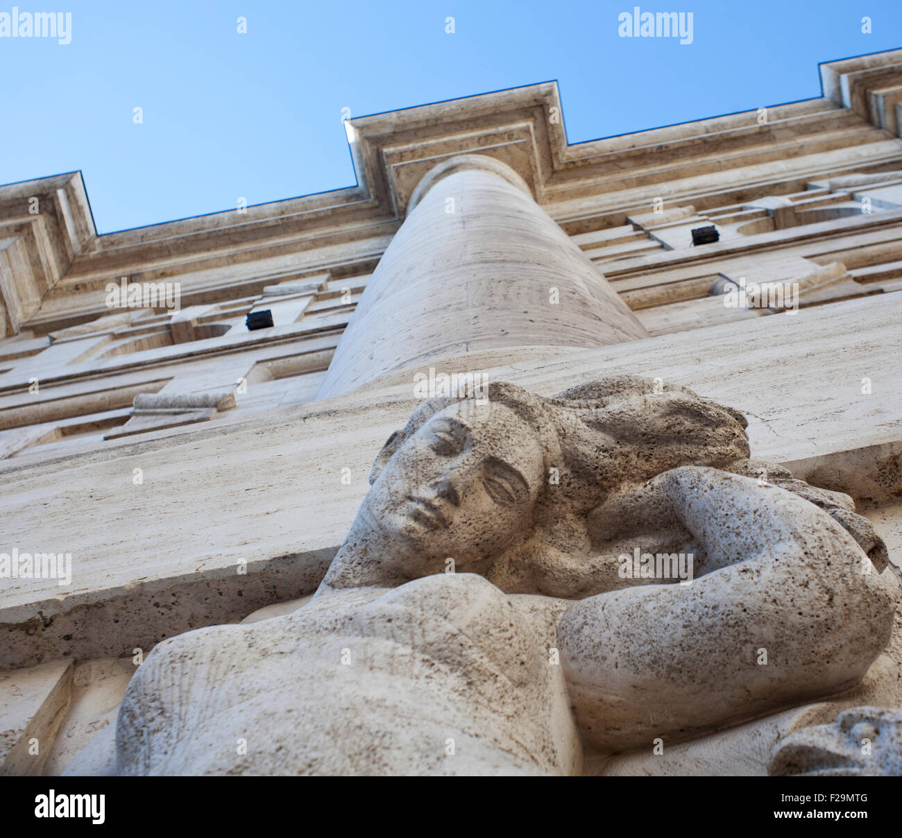 Woman statue of the exchange building of Milan, Italy Stock Photo - Alamy