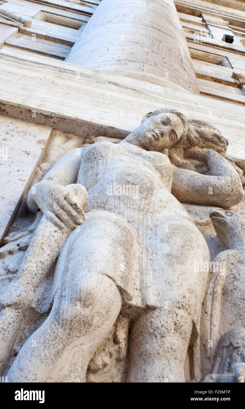 Woman statue of the exchange building of Milan, Italy Stock Photo - Alamy