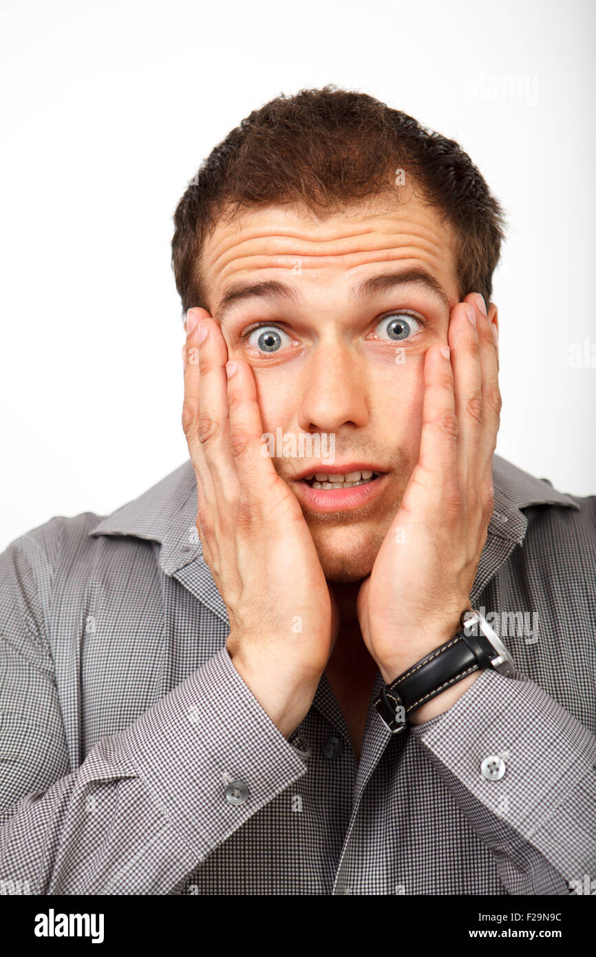 Portrait of amazed surprised or scared young man Stock Photo - Alamy