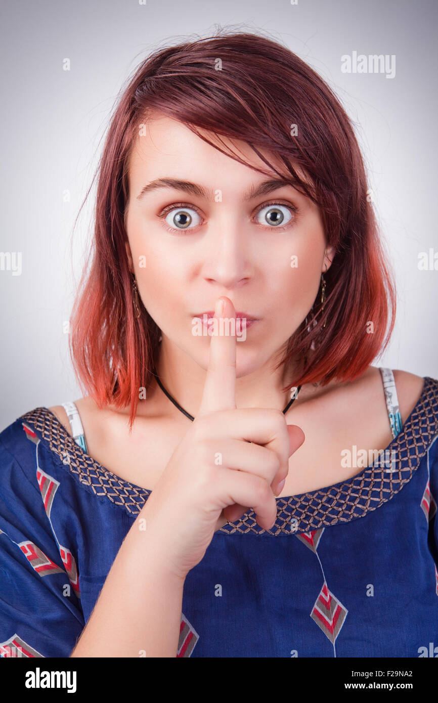 Finger over mouth quiet hi-res stock photography and images - Alamy