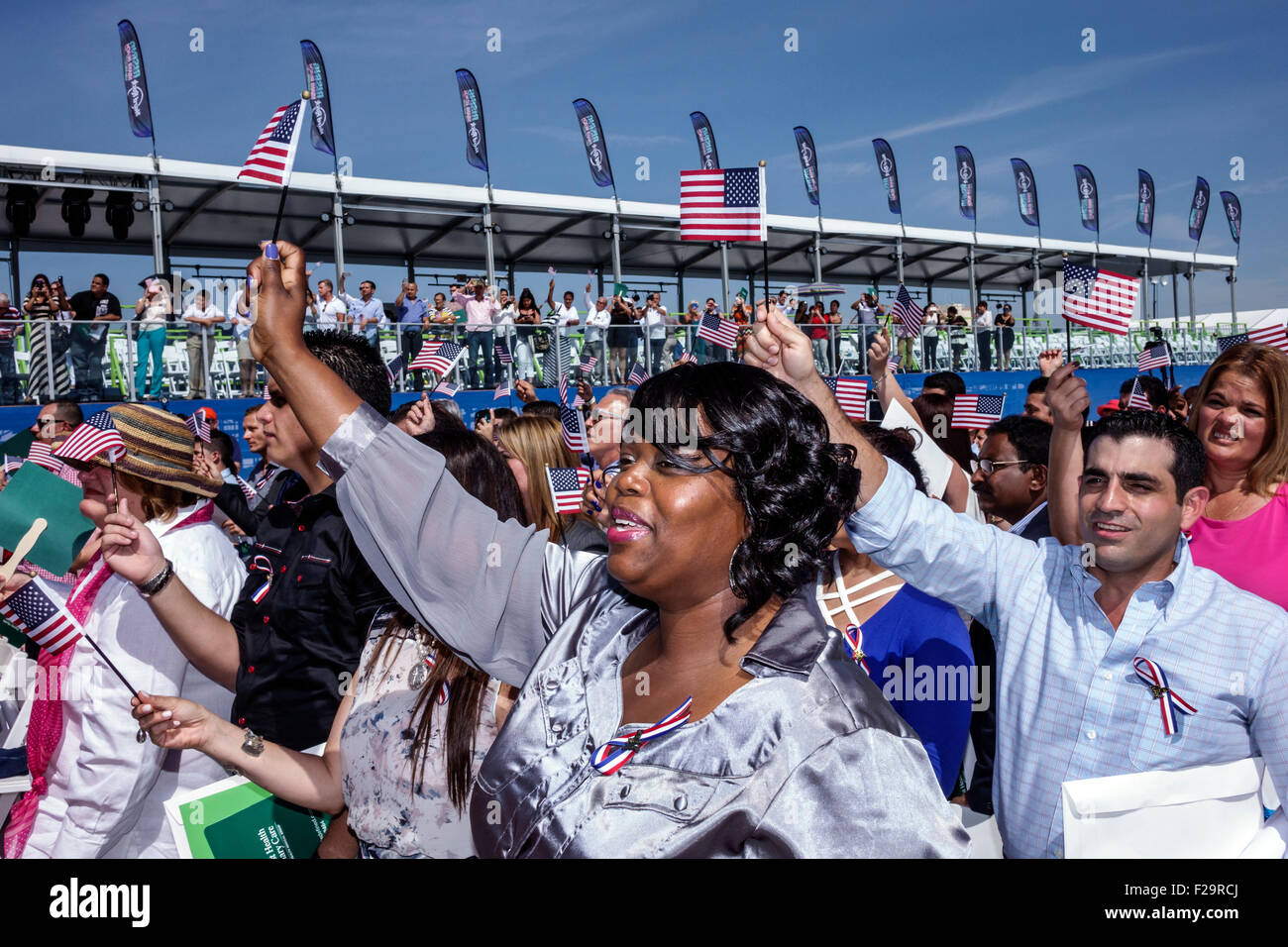 Immigrants black woman man new citizen hi-res stock photography and ...