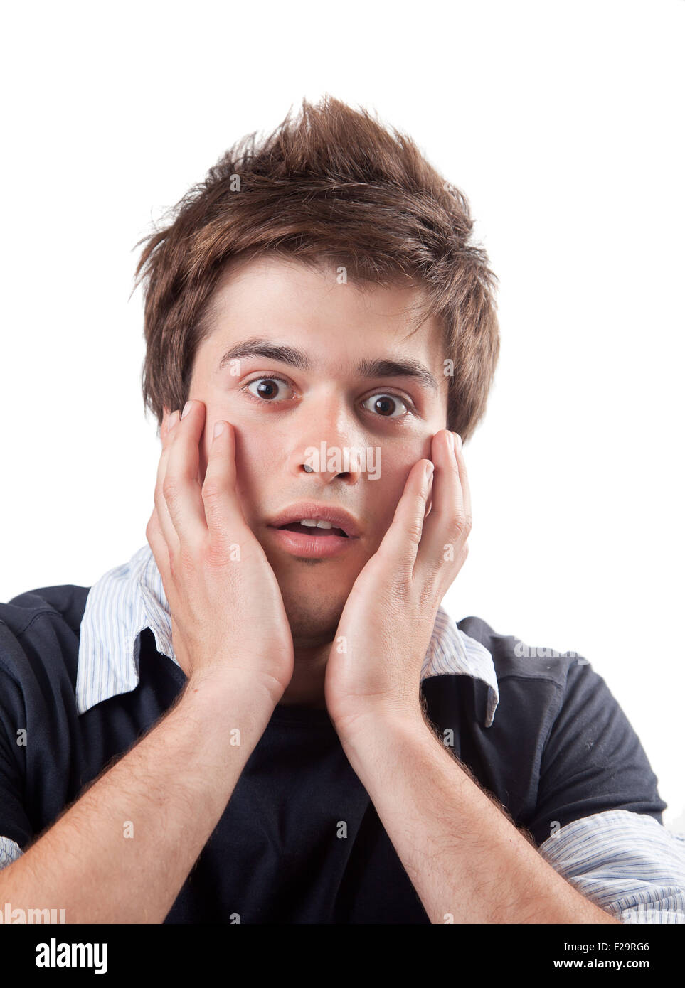 Amazed scared young man isolated on white background Stock Photo - Alamy