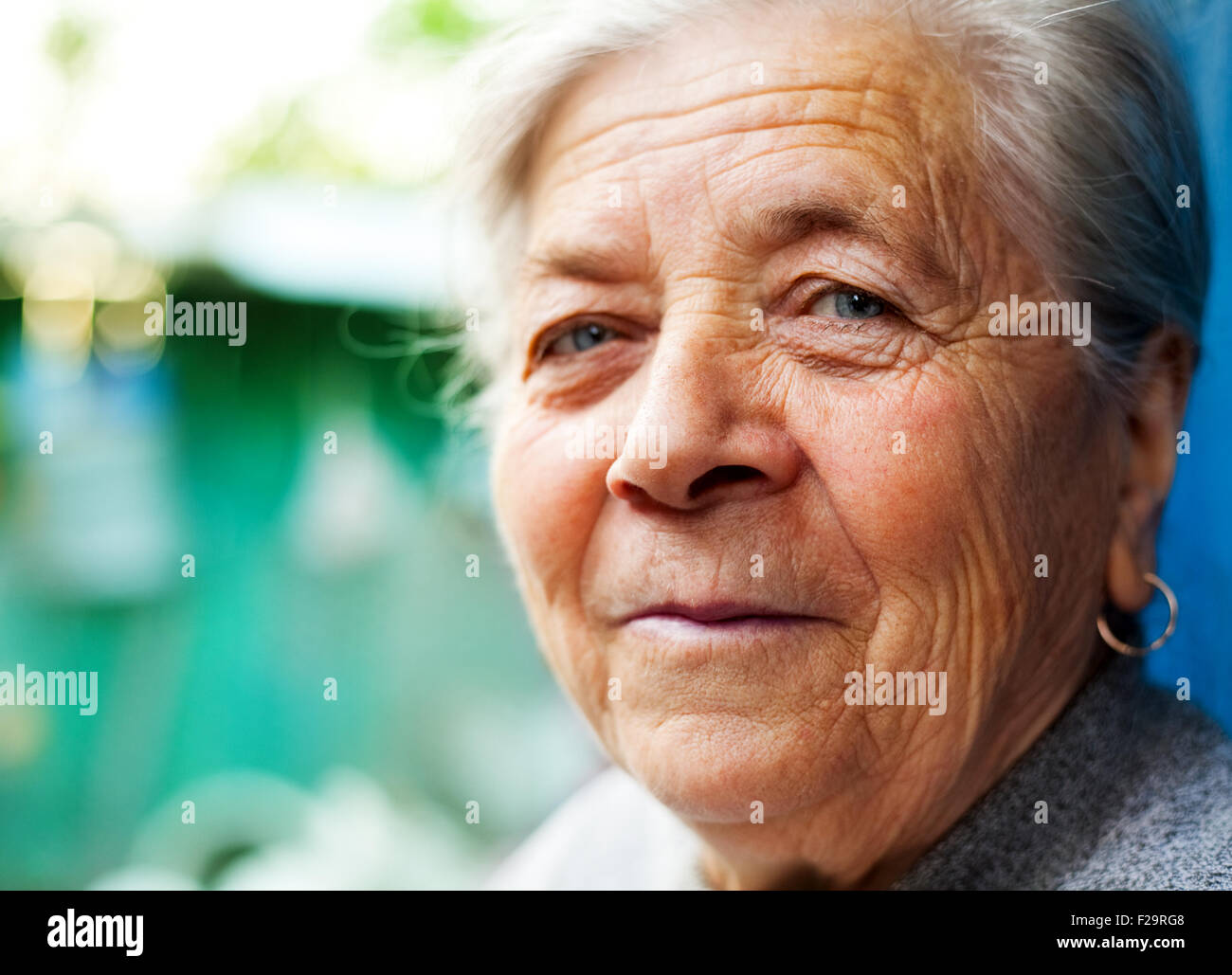 Smile of one content happy senior lady Stock Photo - Alamy