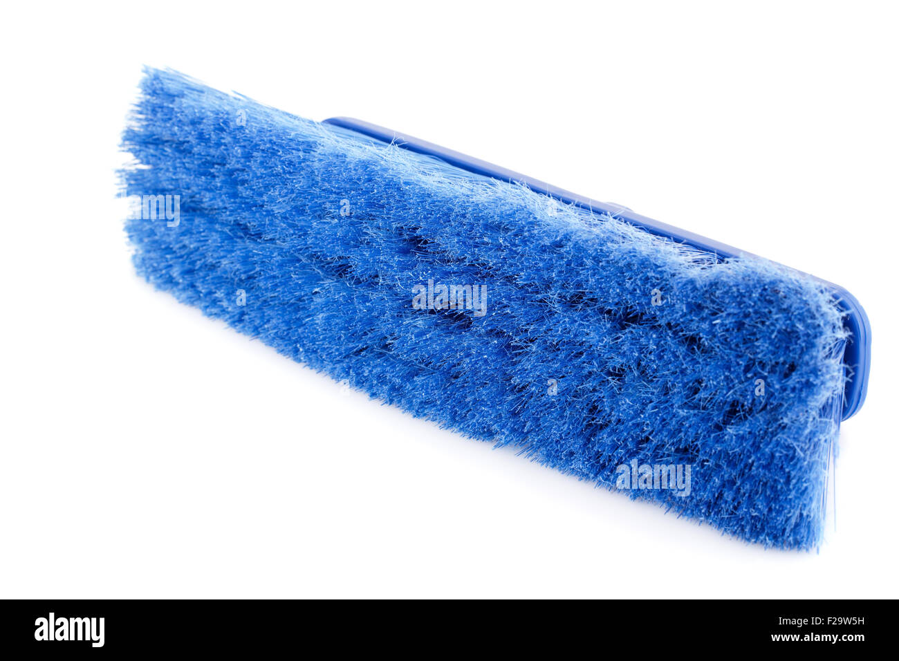 Blue broom isolated on white background Stock Photo - Alamy