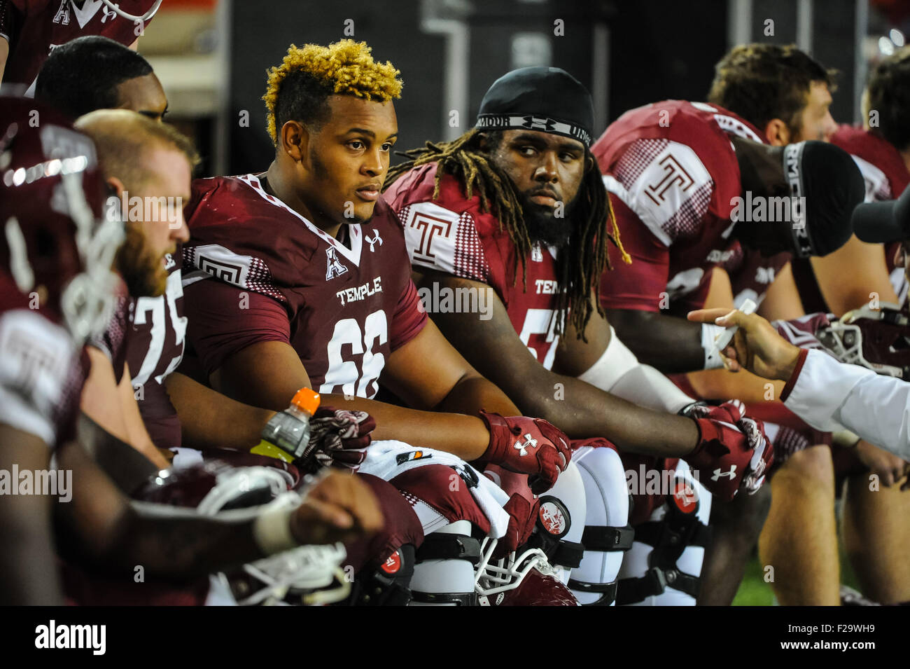 Offensive linemen Zach Mesday and Dion Dawkins (66) of the Temple Owls ...