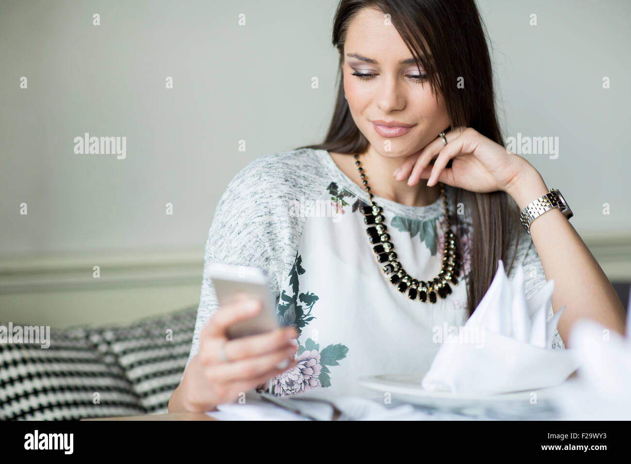 Young woman with mobile phone Stock Photo - Alamy