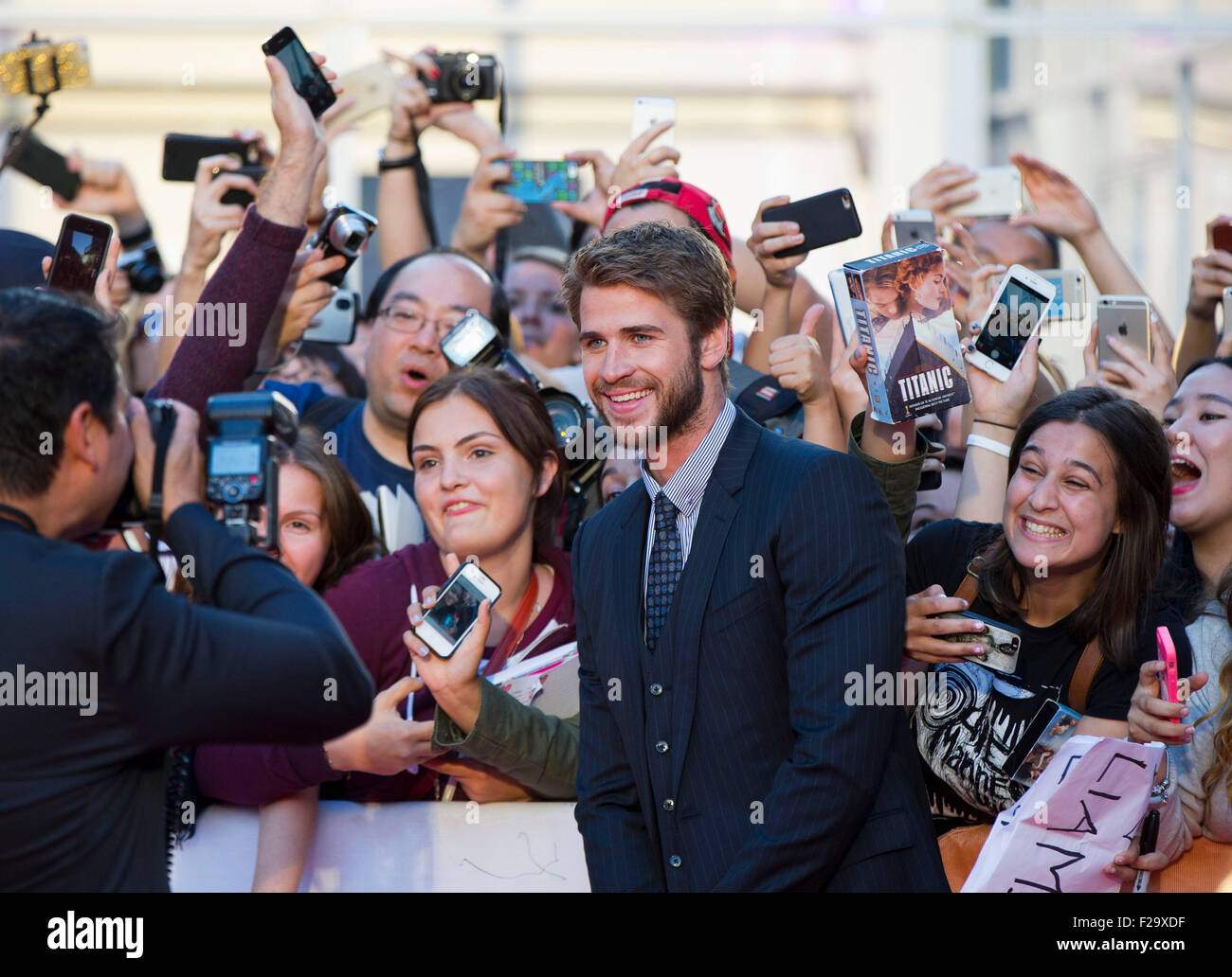 Toronto, Canada. 14th Sep, 2015. Actor Liam Hemsworth (R) poses for ...
