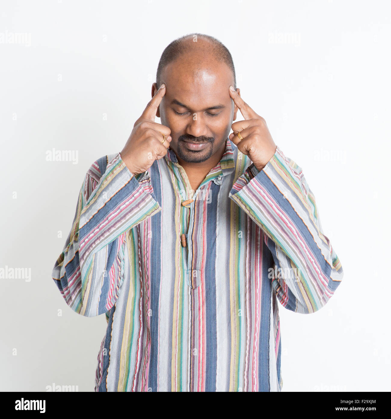 Indian man thinking hi-res stock photography and images - Alamy