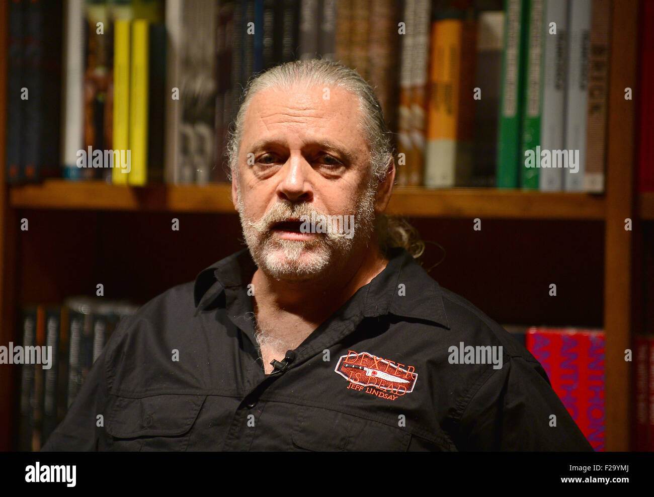 Author Jeff Lindsay greets fans and signs copies of his Dexter novels ...