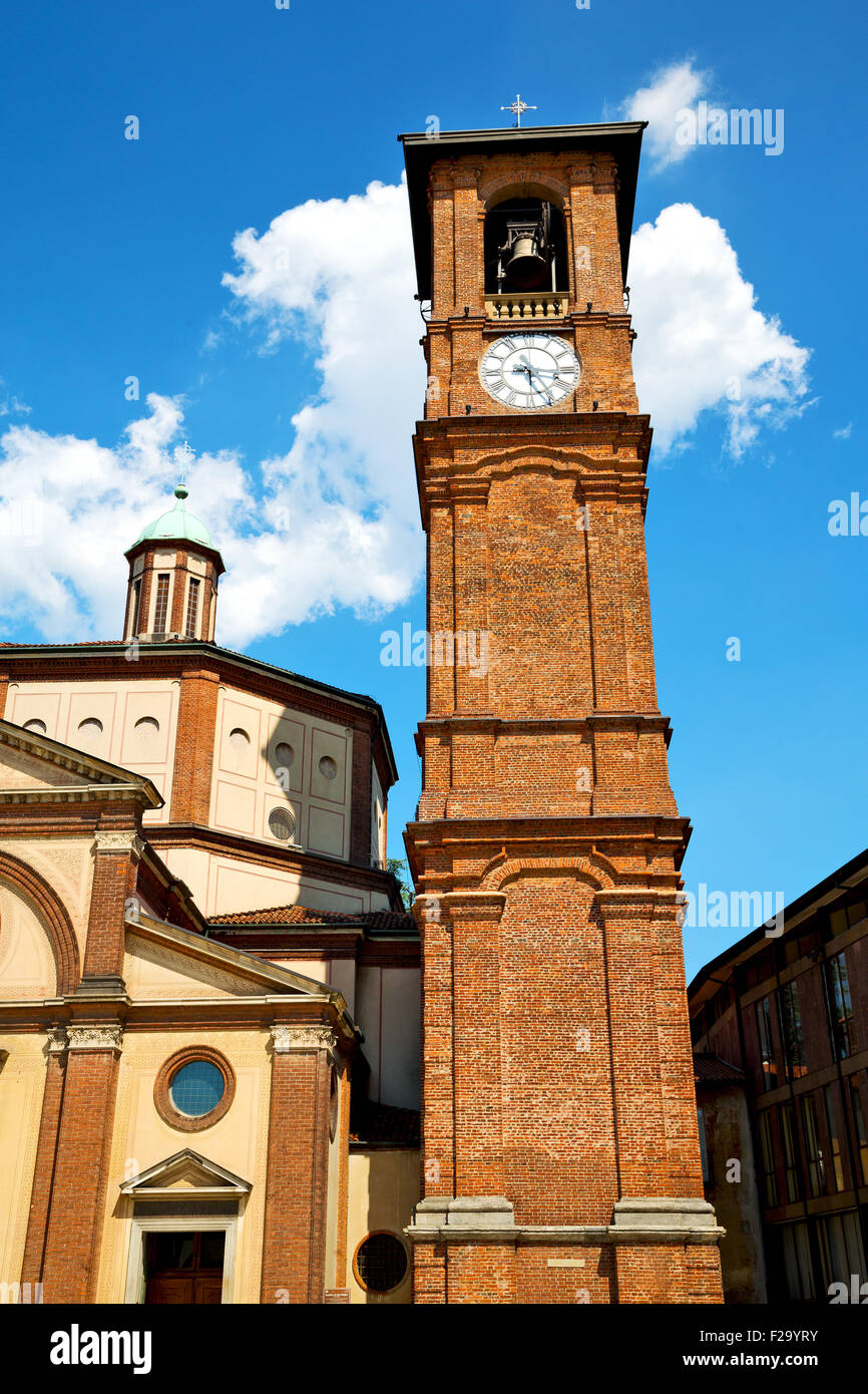 ancien clock tower in italy europe old stone and bell Stock Photo - Alamy