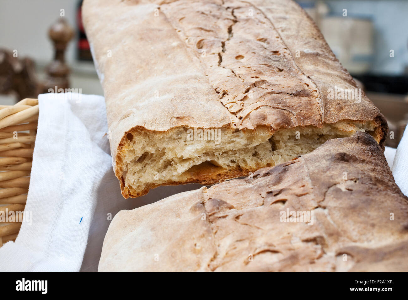 Bread inside a wicker basket Stock Photo - Alamy